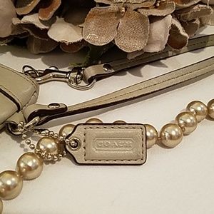 Coach | Bags | Coach Grey Leather Wrislet Care Card | Poshmark